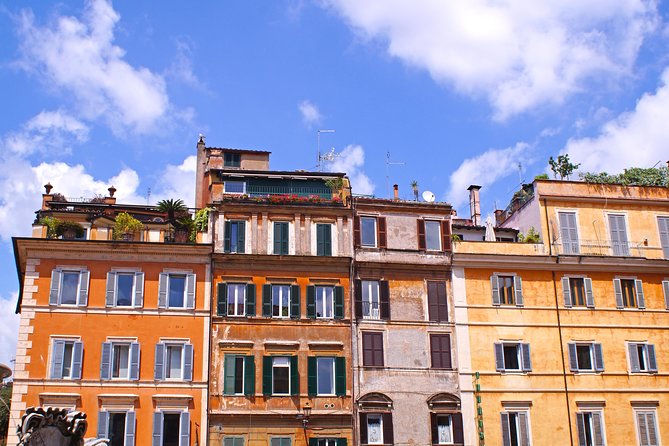 Trastevere and Romes Jewish Ghetto Half-Day Walking Tour - Encountering Historical Landmarks and Cafes
