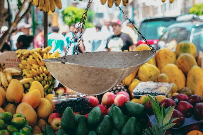 Trending Flavors: Miraflores Walking Tour Including Food and Drinks Tasting - Visiting the Local Market