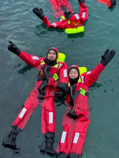 Tromsø: Arctic Fjord Floating in Survival Suit - Key Points