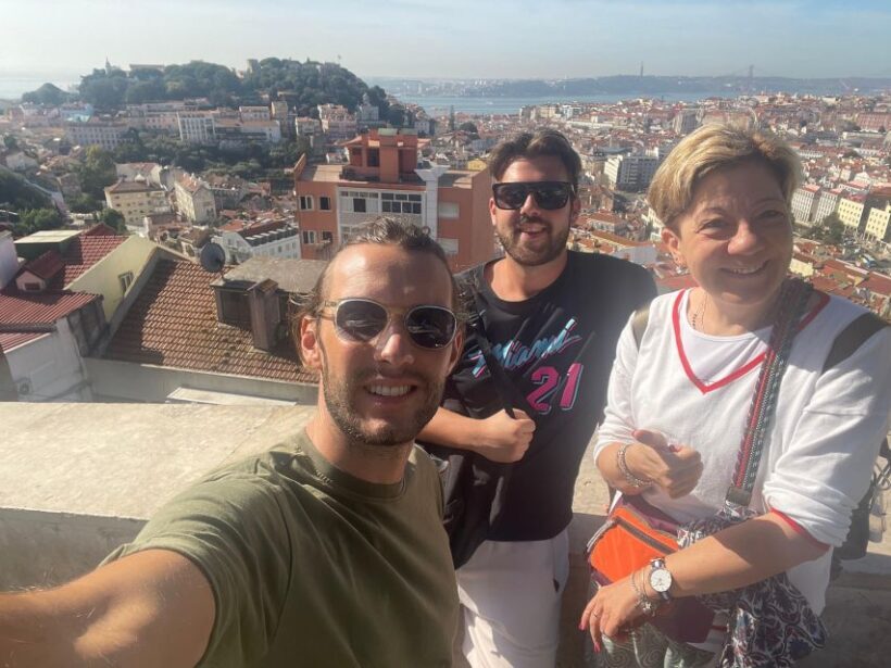 Tuktuk tour in lisbon - viewpoints - street art - churches - The Sum Up