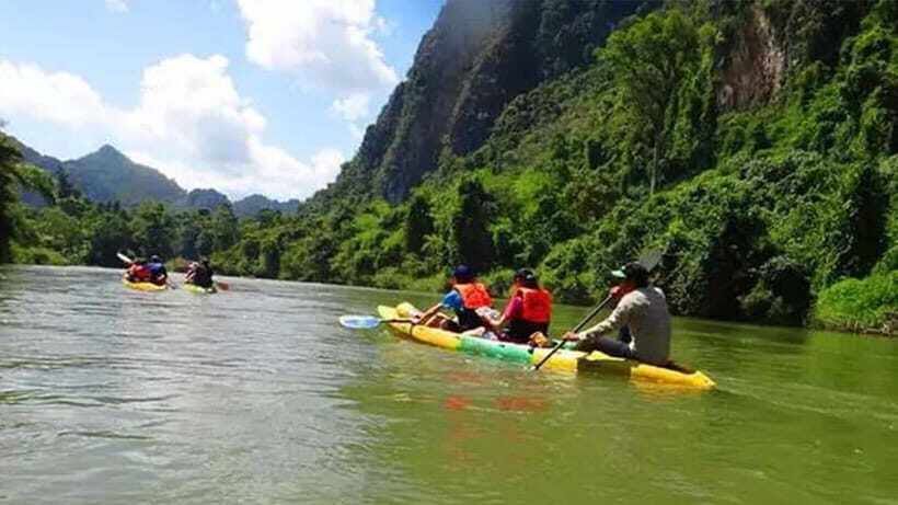 Vang vieng: Kayaking and Paragliding Tour with Hotel Pickup - Key Points