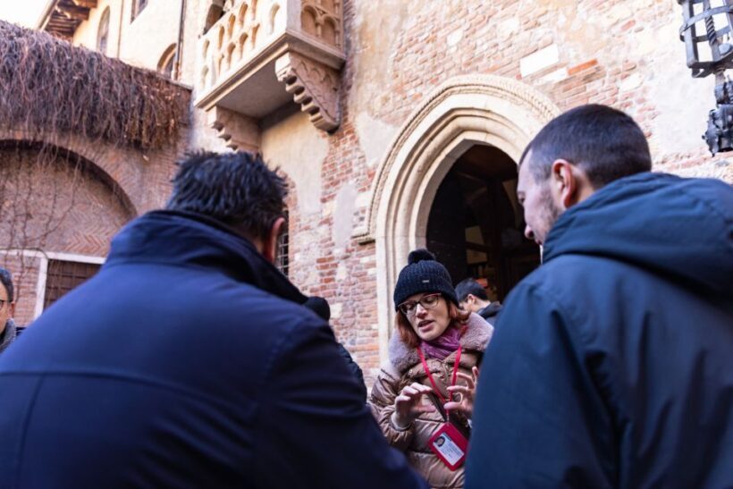 Verona: City Highlights & Street Food Walking Tour - Piazza Erbe and the Lamberti Tower