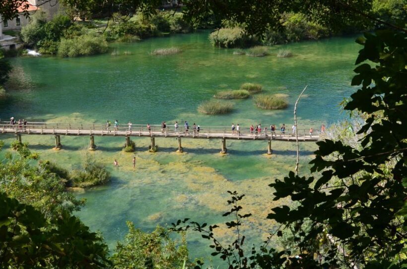 Vodice: Krka Waterfalls National Park Boat Tour - Approaching Krka: Waterfalls and Nature