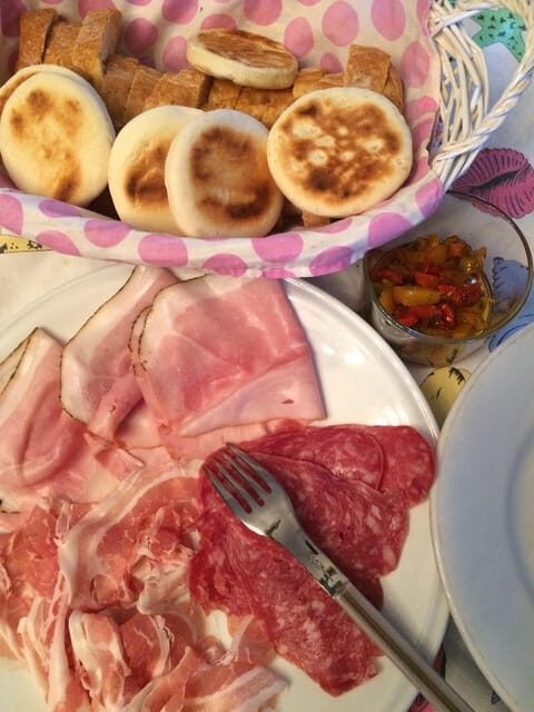 Walking Tour in Bologna with Tastings and Stories - Key Points