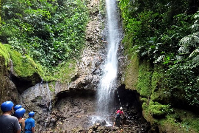 Waterfall Rappelling and White Water Rafting - Enjoying the Swimming Stop