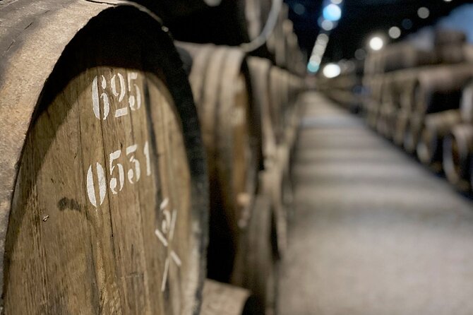 Wine Tasting With Tapas Walking Tour Review - Meeting Point and Pickup Information