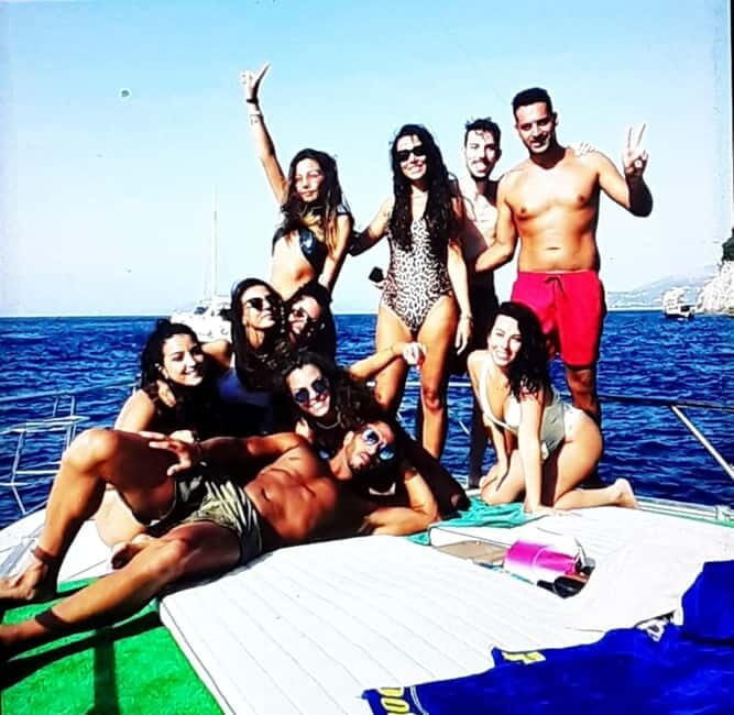 WONDERFUL SUNSET LET'S TOAST IN THE WAKE OF THE SUNSET - Discovering the Amalfi Coast Sunset Cruise
