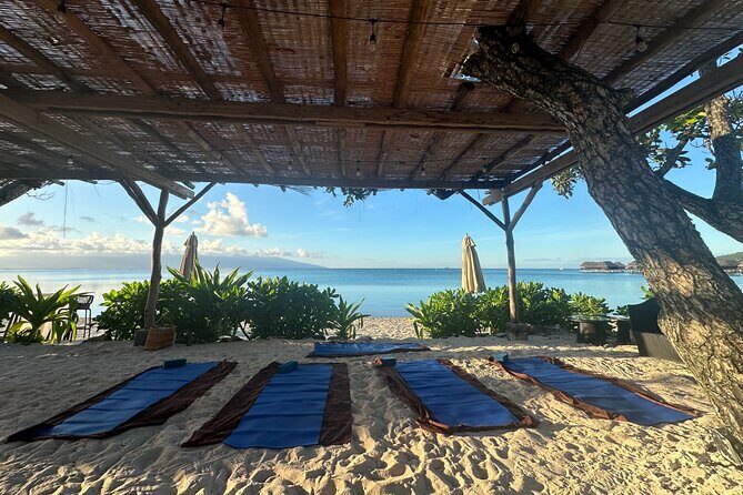 Yoga at sunrise at Sofitel Moorea, overlooking Tahiti - An Overview of the Sunrise Yoga Experience in Moorea