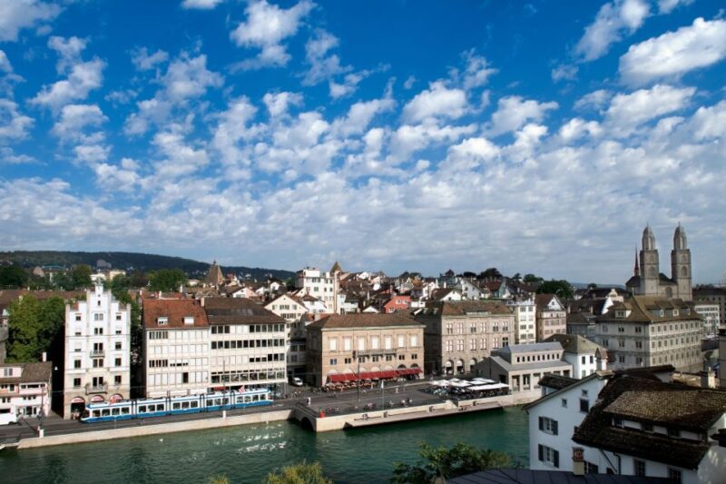 Zurich: City Bus Tour With Audio Guide and Lake Cruise - Relaxing Boat Ride on Lake Zurich