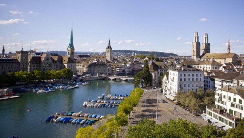 Zurich: City Sightseeing Tour With Lake Cruise - Enjoying the Scenic Boat Cruise