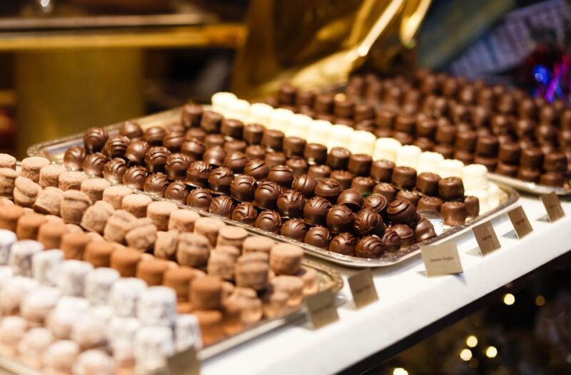 Zurich: City Tour W/ Boat Trip, Lindt Museum, & Cable Car - Indulging in Swiss Delights